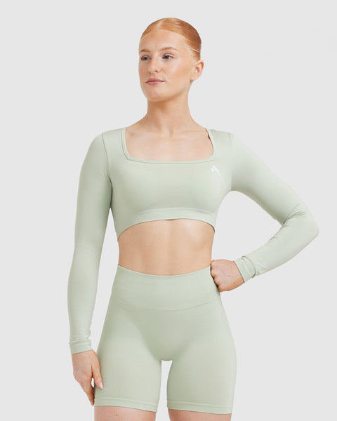 Effortless Square Neck Crop Long Sleeve Top with White Logo Tea Green ...